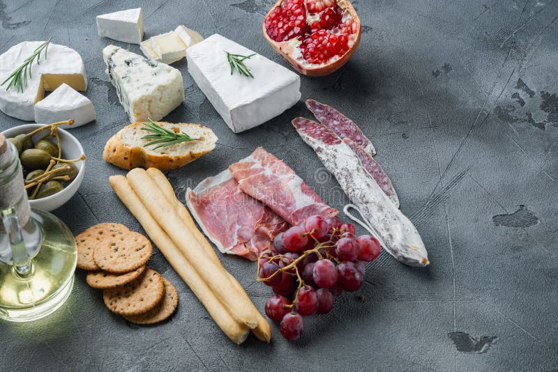 Spanish Snacks, Meat Cheese, Herbs, on Gray Background with Copy Space ...