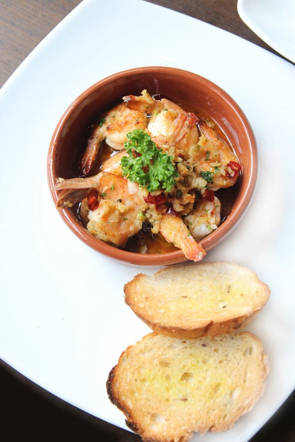 Spanish Tapas Dish, Sizzling Prawns with Chili and Garlic Stock Image ...