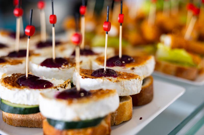 Spanish Tapas - Pinchas with Goat Cheese, Cucumber and White Bread ...