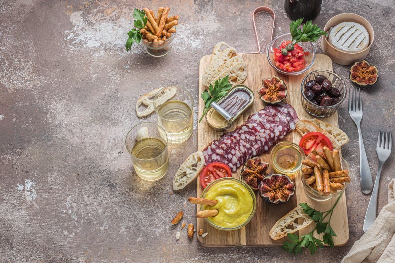 Spanish Tapas Set with Salami, Figs, Cheese and Bread, Copy Space Stock ...