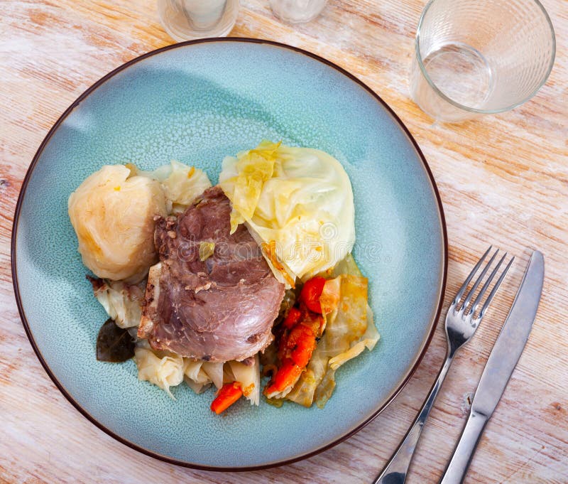 Spanish Traditional Dish - Pork Cheeks with Cabbage Stock Image - Image ...