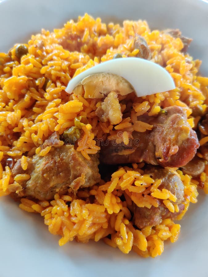 Spanish Typical Meat Paella with Egg on White Background Stock Photo ...