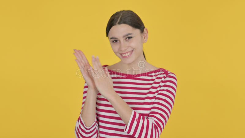 Spanish Woman Clapping on Yellow Background Stock Video - Video of ...
