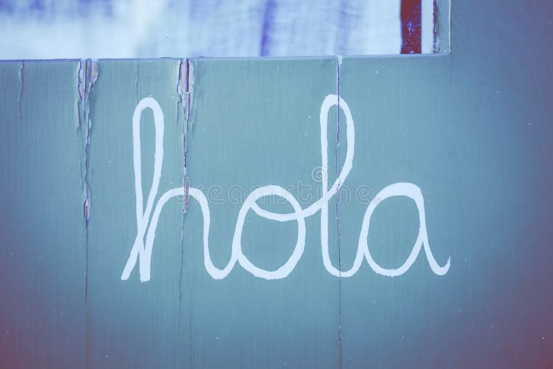 Spanish word Hola - Hello stock image. Image of sign - 49203535