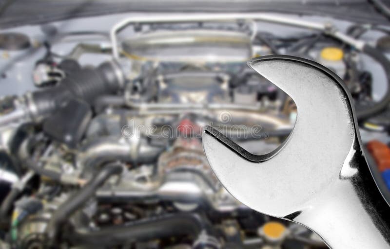 Spanner with Car Engine in Background Stock Photo - Image of powerful ...