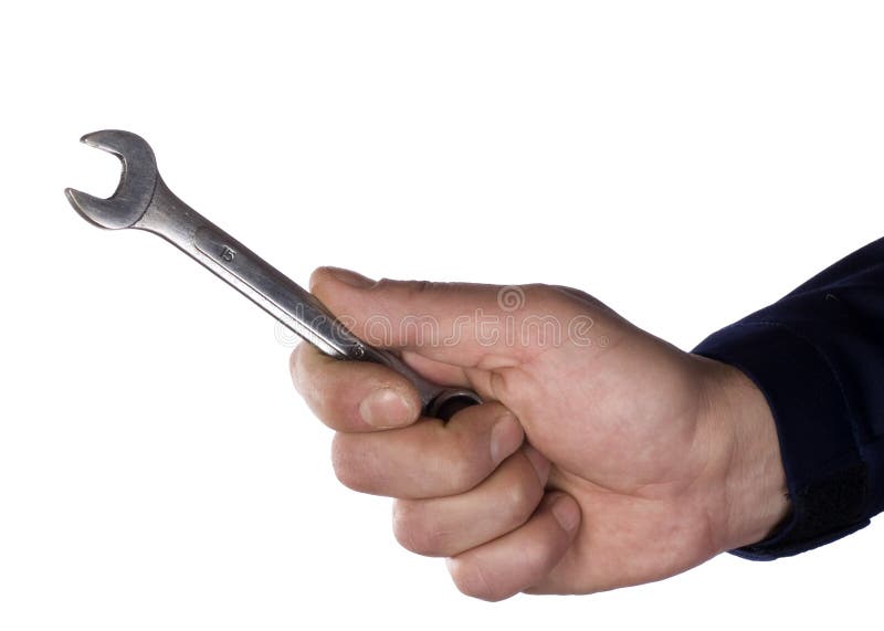 Spanner in the hands stock photo. Image of handyman, plumber - 12642606