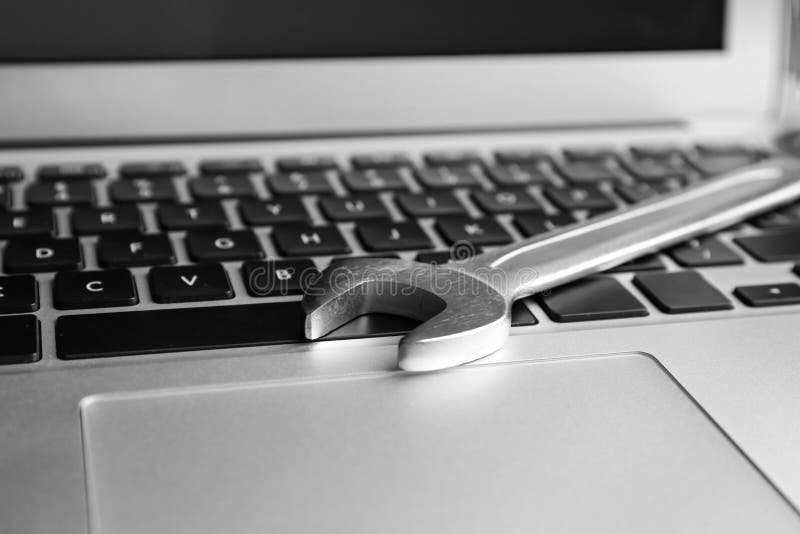 Spanner on Laptop. Concept of Technical Support Stock Image - Image of ...