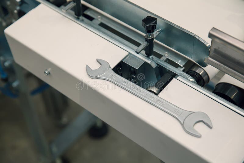 Spanner on machine stock photo. Image of maintenance - 138060036