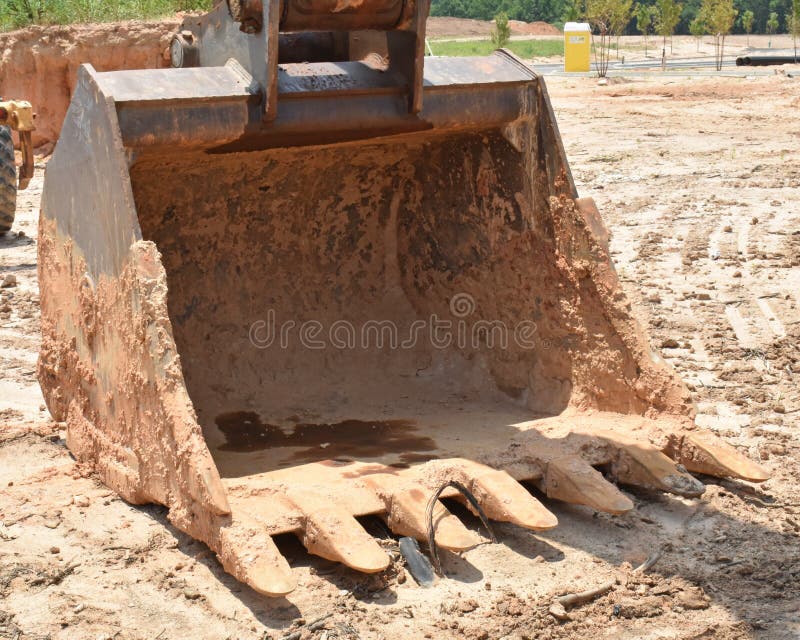 Bucket of Excavator Sits on Ground Stock Image - Image of sits, bucket ...