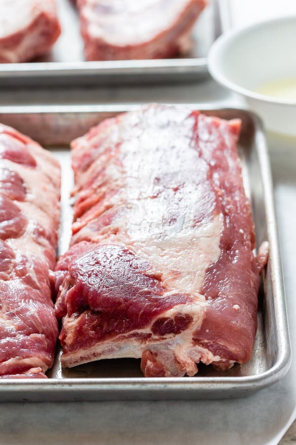 Spare Ribs Uncooked on Stainless Steel Platter Stock Photo - Image of ...