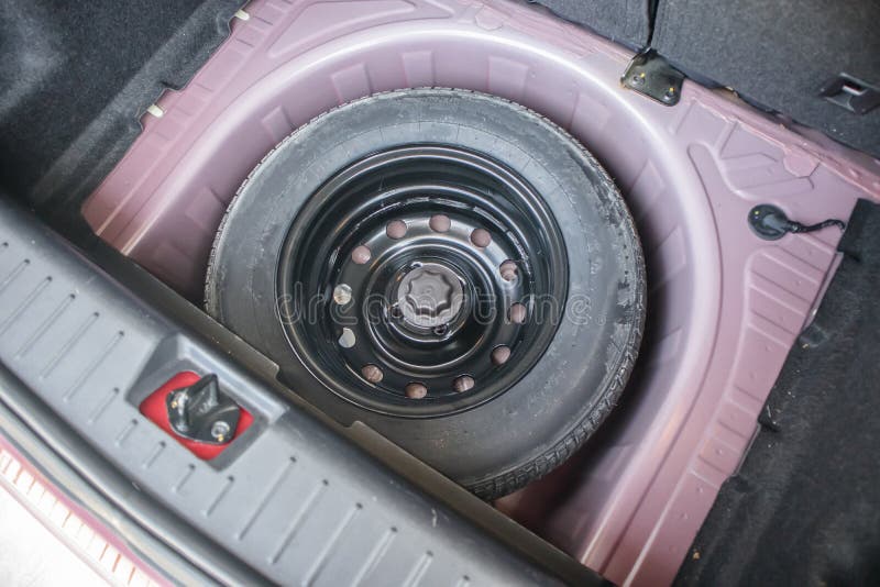 Spare Tire in the Modern Compact Car Stock Photo - Image of industry ...