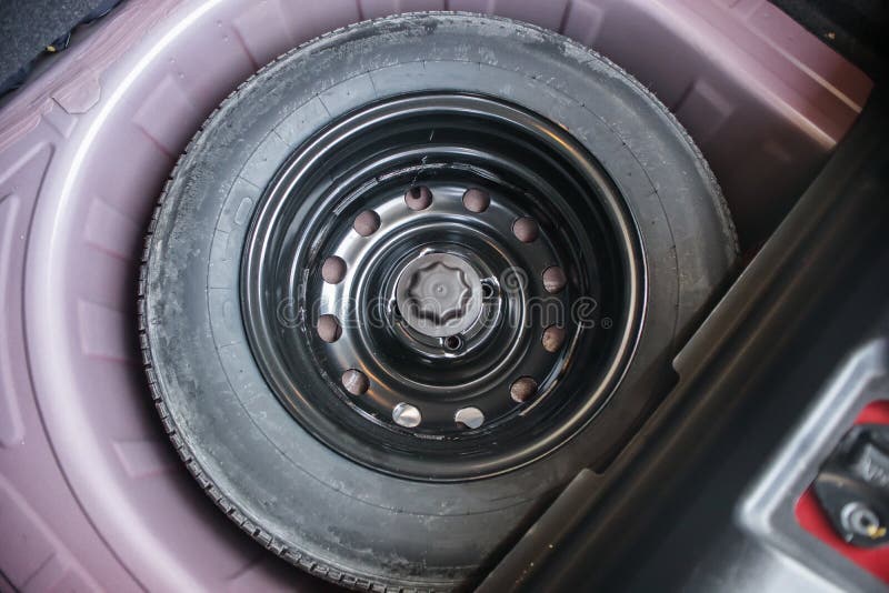 Spare Tire in the Modern Compact Car Stock Photo - Image of modern ...