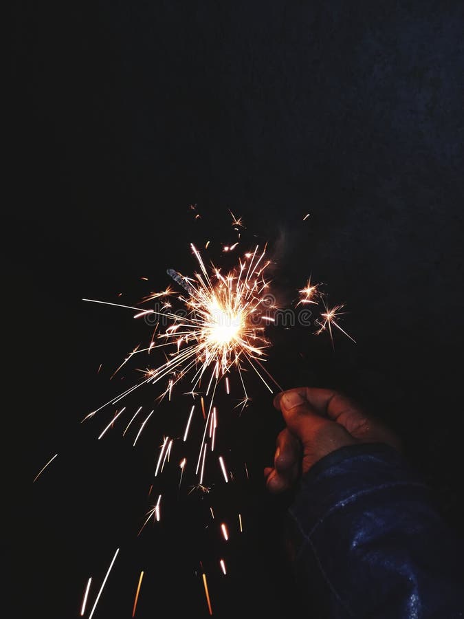 A Spark Crackers in a Manâ€™s Hand Stock Image - Image of spark ...