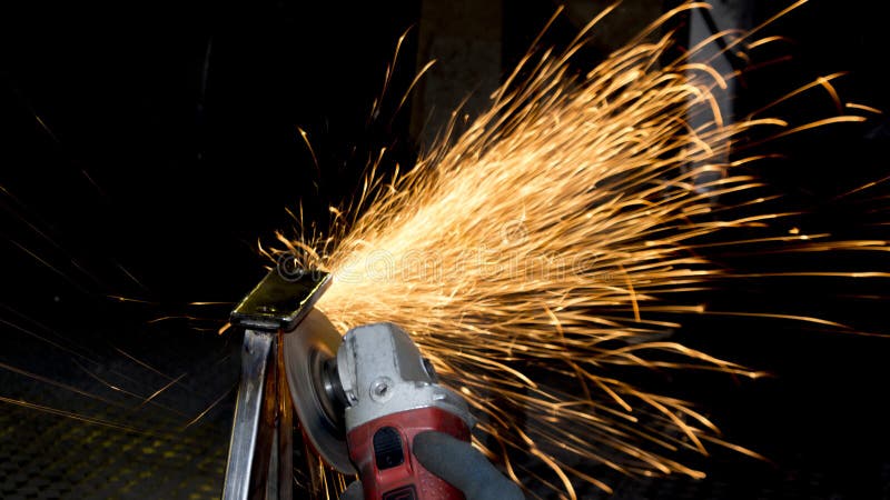Spark on Dark Background. Processing of Metal Products and Metal ...