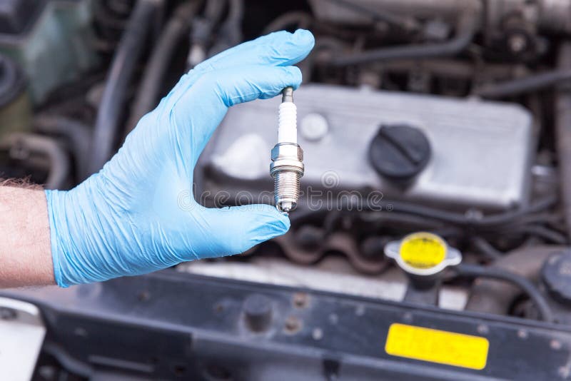 Spark plug stock photo. Image of single, hand, fuel, mechanic - 94550374