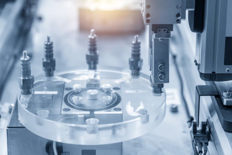 The Spark Plug Manufacturing Process with Automation Systems. Stock ...