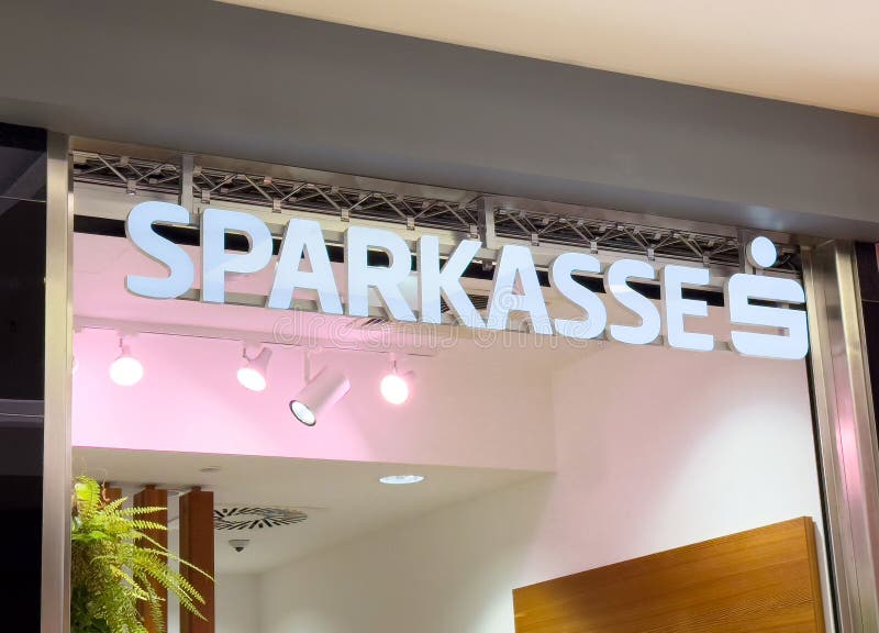 Sparkasse Bank Entrance with Illuminated Signage in Modern Interior ...