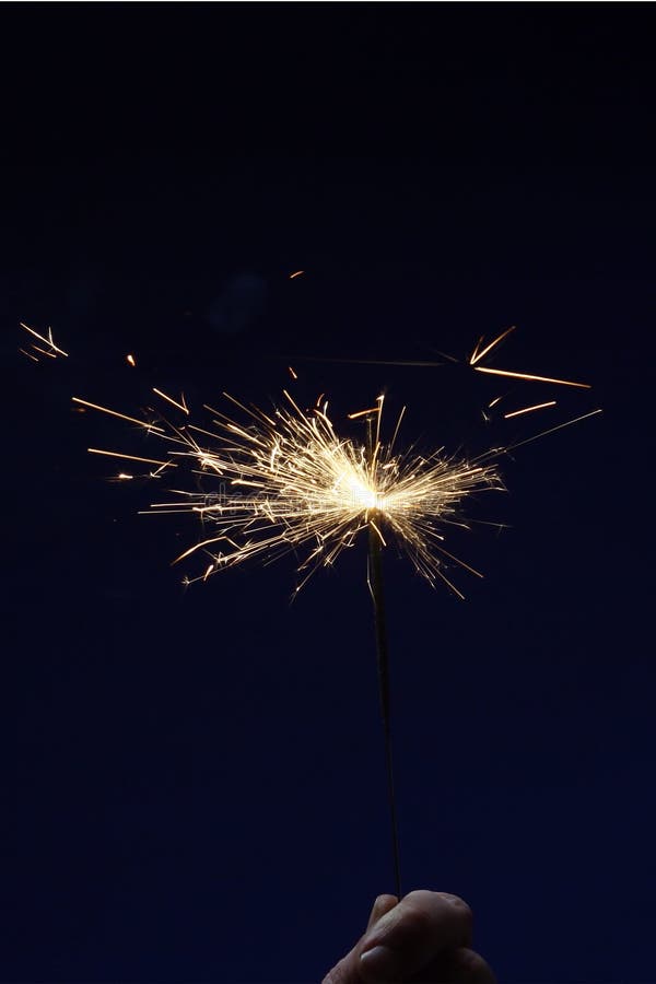 Sparkler 3 stock photo. Image of happy, happiness, hand - 1688240