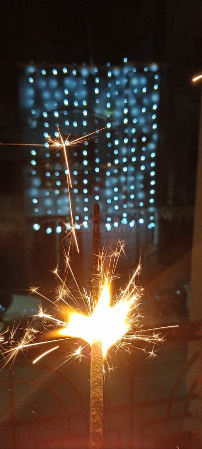 Sparkler on Blue Light Background during Diwali 2022, a Small Firework ...