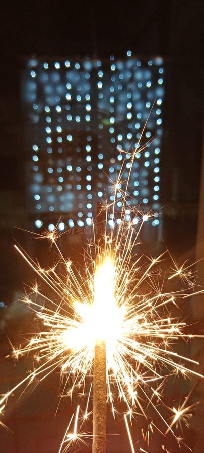 Sparkler on Blue Light Background during Diwali 2022, a Small Firework ...