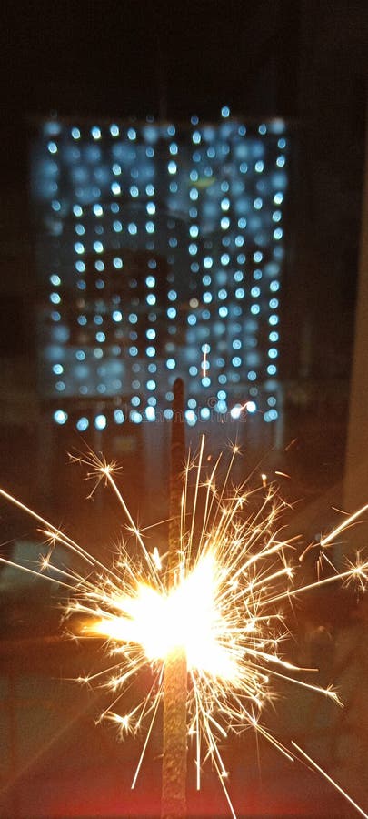 Sparkler on Blue Light Background during Diwali 2022, a Small Firework ...