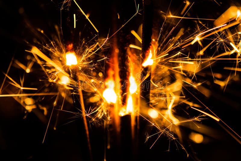 Sparkler Glowing in the Dark Stock Photo - Image of flare, gold: 153461954
