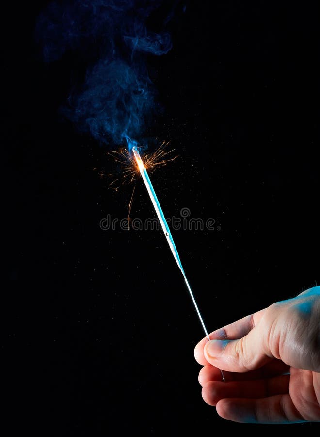 Sparkler in hand stock image. Image of holding, sparkle - 74068673