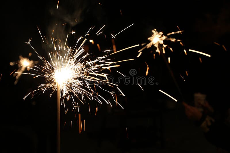 Sparkler at night stock image. Image of fire, sparks - 25189355