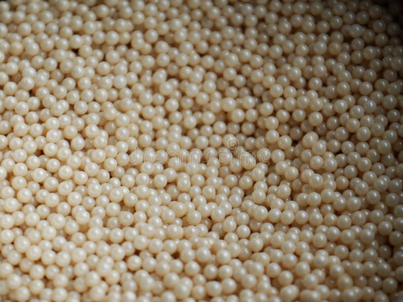 Sparkling beads in pearl stock image. Image of close - 114416801