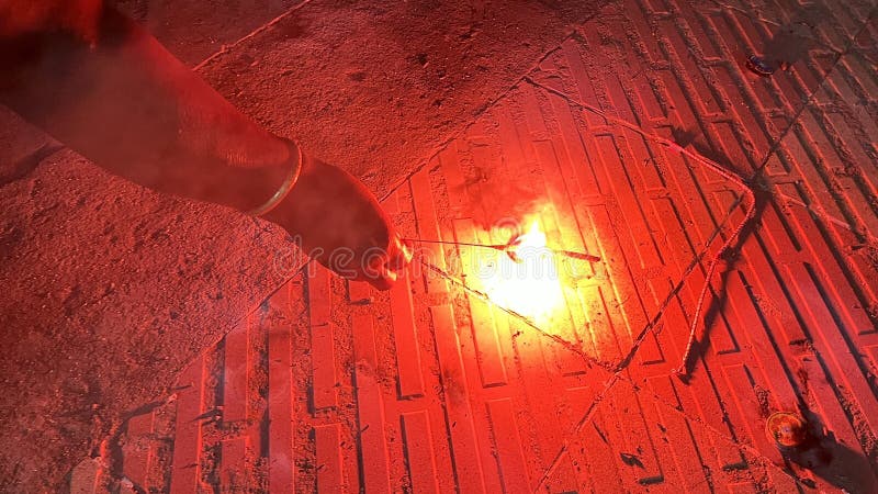 Sparkling Effect of a Red Color Cracker Stock Image - Image of ...