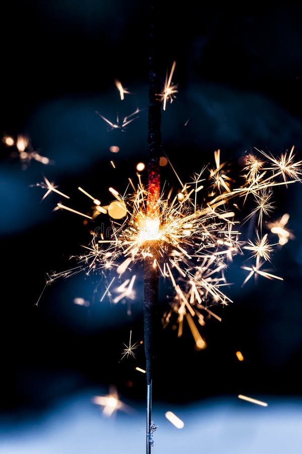 Sparkling Fire Stick with Particles Stock Image - Image of celebration ...