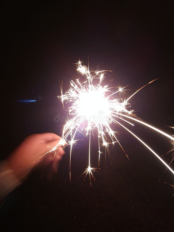 Sparkling Flash of Light stock photo. Image of sparkler - 258382162