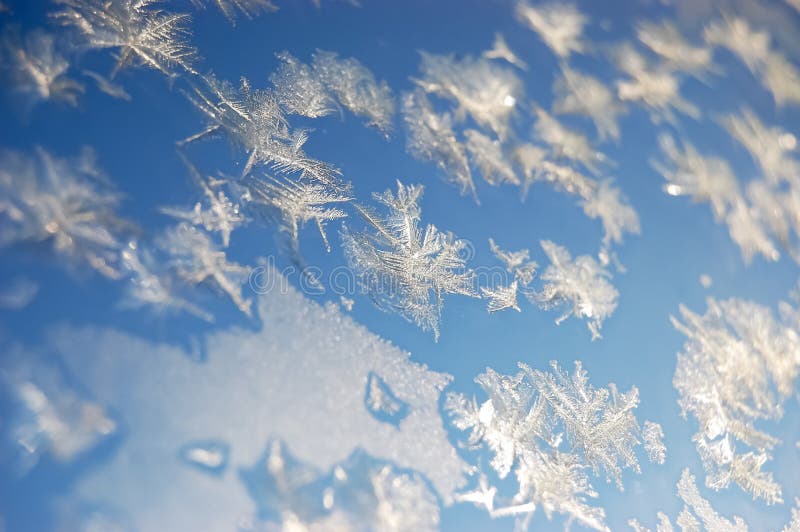 Sparkling Snowflakes on a Window Stock Photo - Image of snowflakes ...