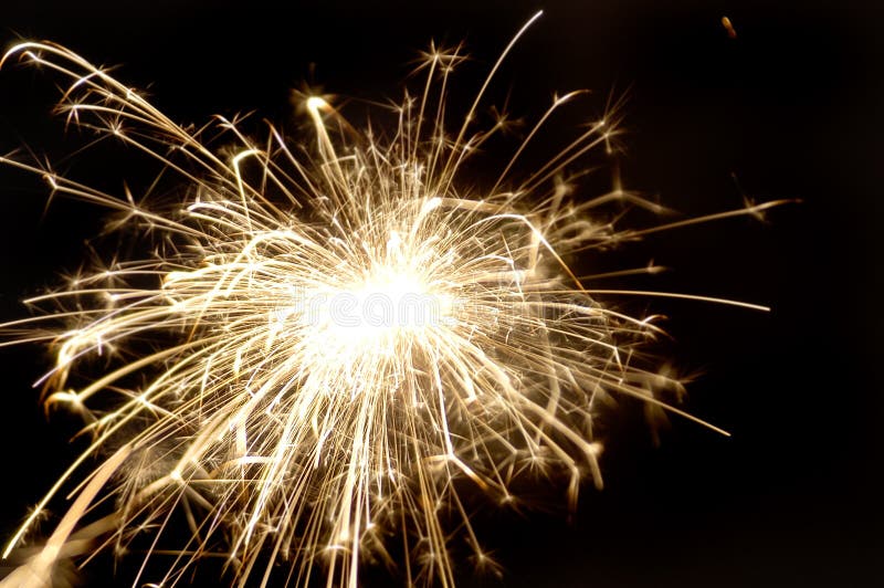 A Sparkling Sparkler at a Party or New Year`s Eve Stock Photo - Image ...