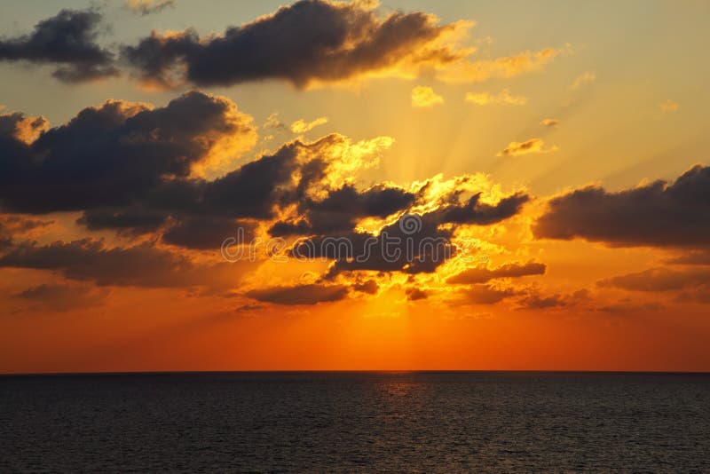 Sparkling sunset above sea stock image. Image of dusk - 10815329