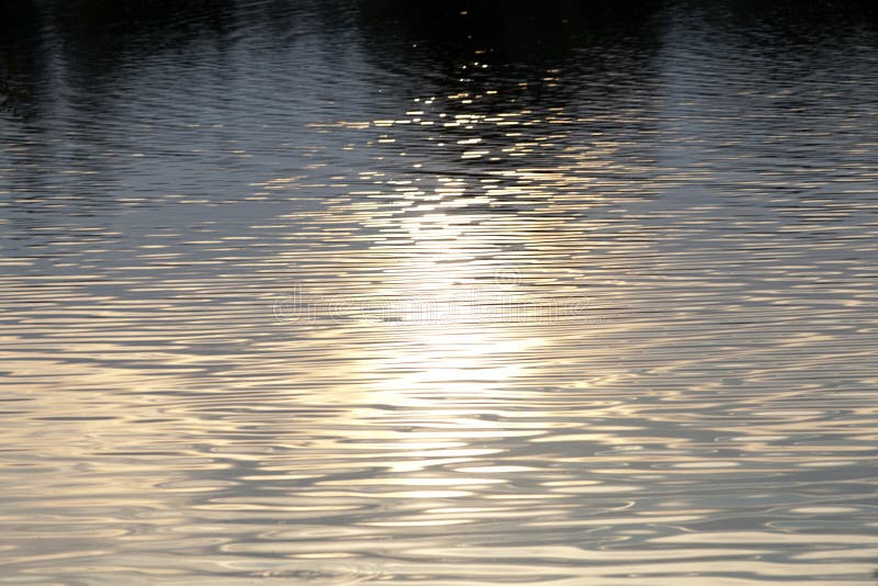 Sparkling Water with Lights of Sunset Stock Image - Image of backlight ...