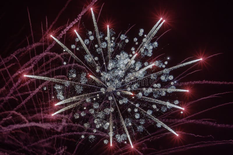 Sparkly Burst of a Red Firework in the Night Sky Stock Photo - Image of ...