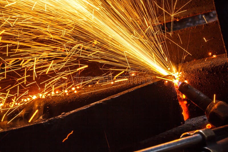 Sparks while cutting steel stock photo. Image of spark - 58529144