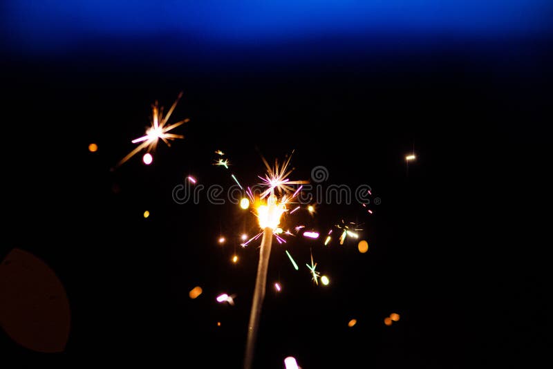 Sparks in the Dark. Sparks. Christmas and New Year Time Stock Image ...