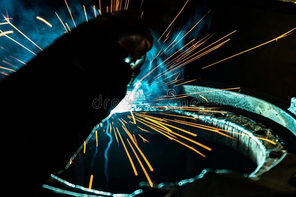 Sparks from Electro Gas Welding at Work in an Electromechanical ...