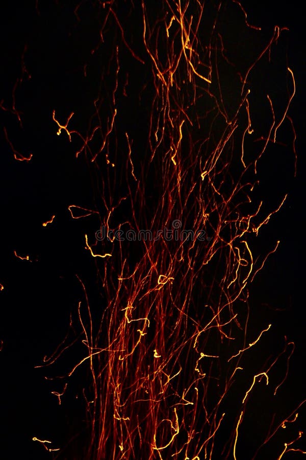 Sparks of Fire Rising in the Dark Stock Photo - Image of burn, flames ...
