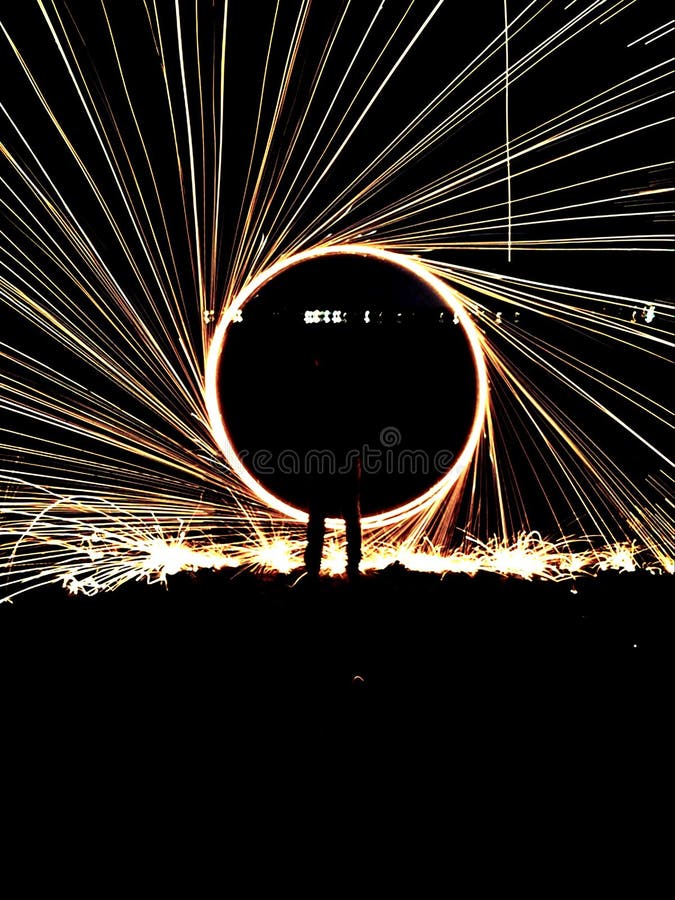 Sparks Flying in the Night Sky Stock Photo - Image of flying, wool ...