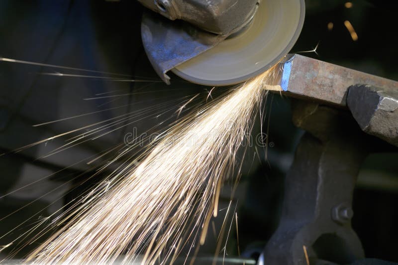 Sparks from a grinder. stock photo. Image of bright, manufacturing ...