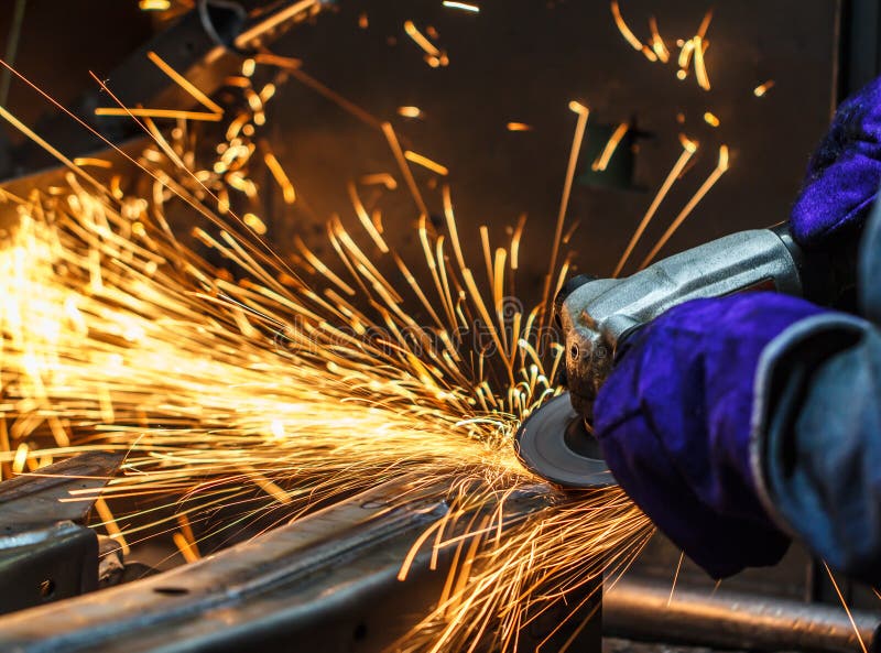 Sparks while grinding iron stock image. Image of industrial - 57098717