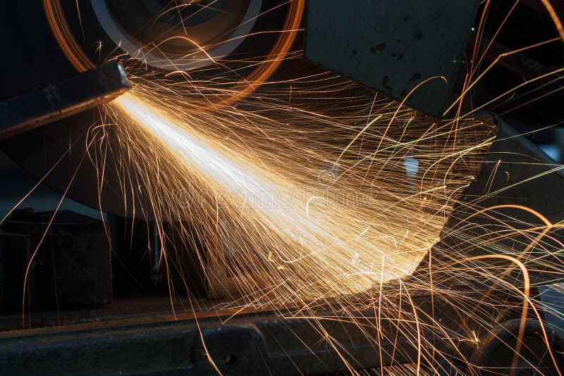 Sparks while grinding iron stock image. Image of construction - 57088783