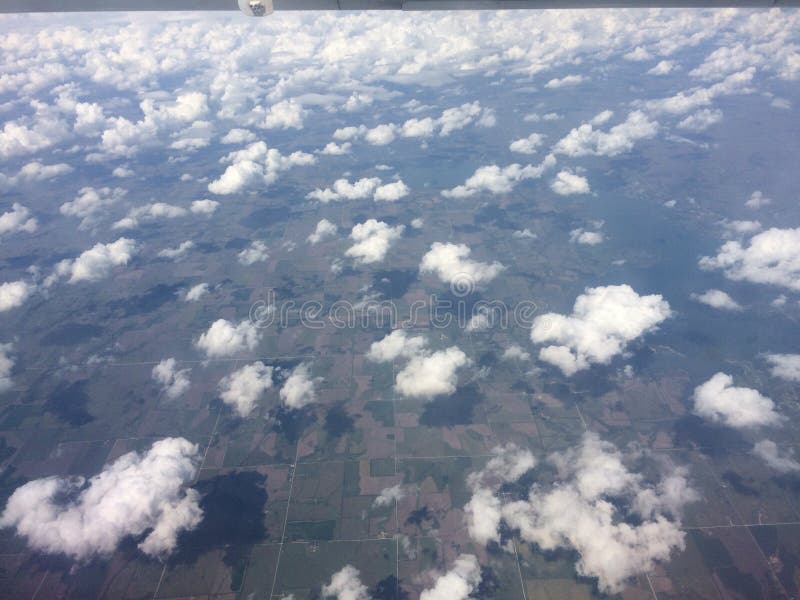 Sparse Fluffy Clouds from Above Stock Photo - Image of plane, cotton ...