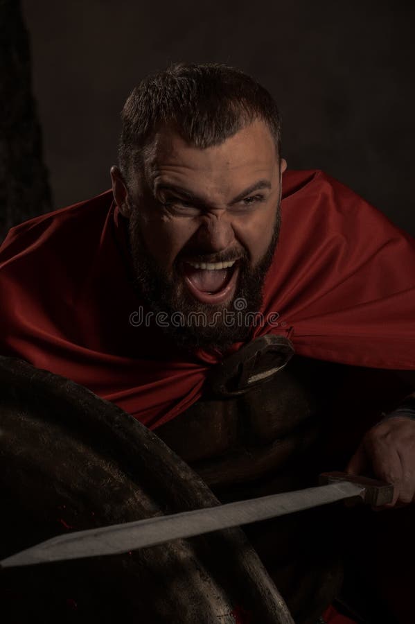 Spartan Warrior during an Attack with a Sword Stock Image - Image of ...