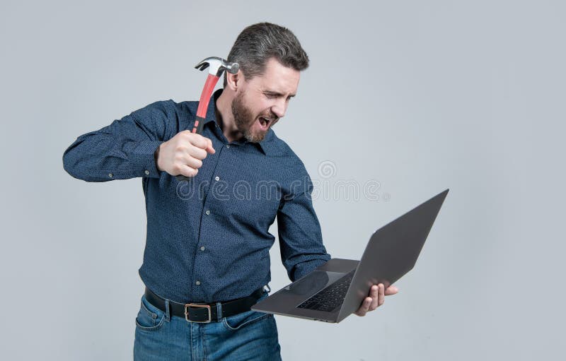 Spate of Cyberattack. Hacker Assaulting Computer with Hammer Stock ...