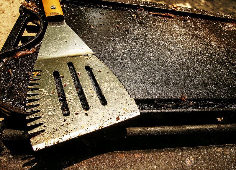 A Spatula on a Greasy Griddle Stock Image - Image of leaves, spatula ...