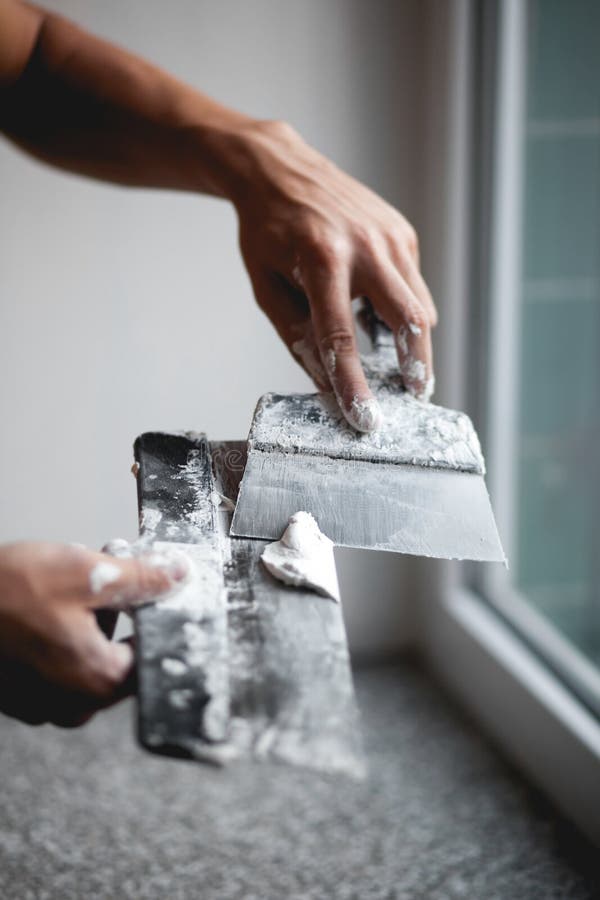 Spatula in Hand, Plaster, Building Materials Stock Photo - Image of ...